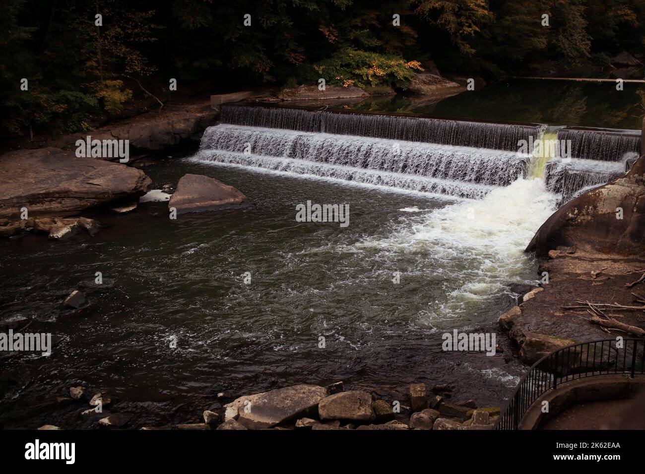 A flowing water in the river dam Stock Photo - Alamy