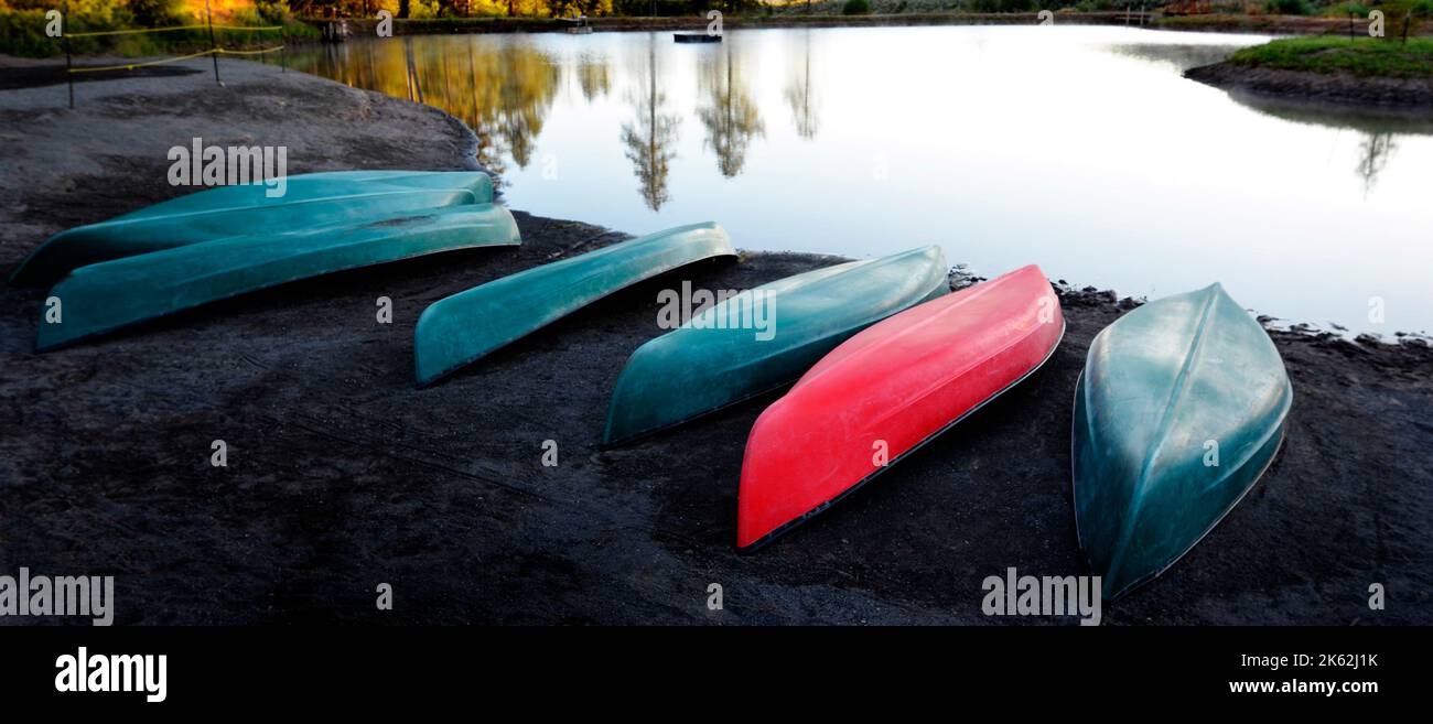 Canoes boats near lake in mountains wilderness for recreation Stock ...