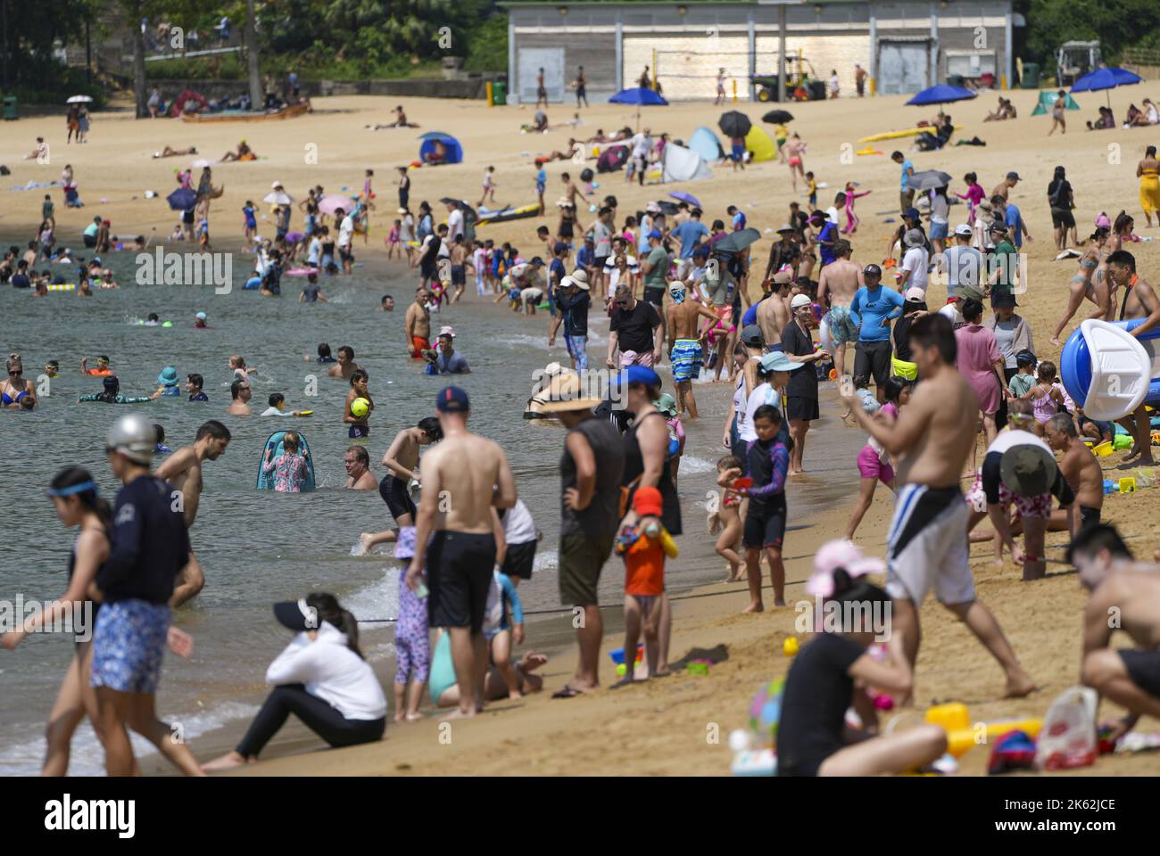 People swim at Repulse Bay on the Chung Yeung Festival public holiday ...