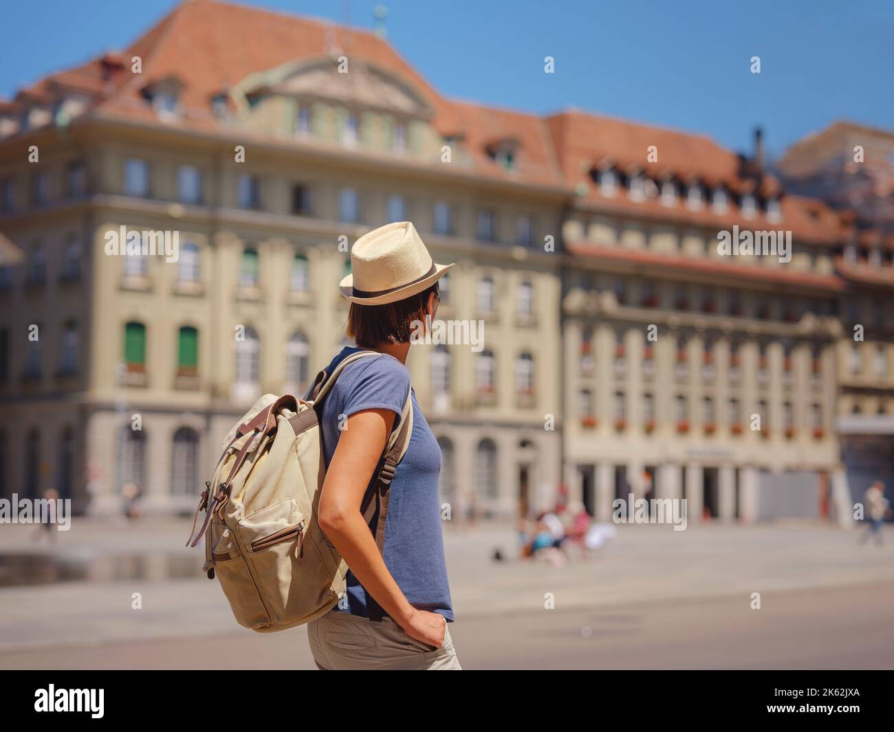 Woman having a great vacation in Switzerland, BErn, Federal palace ...