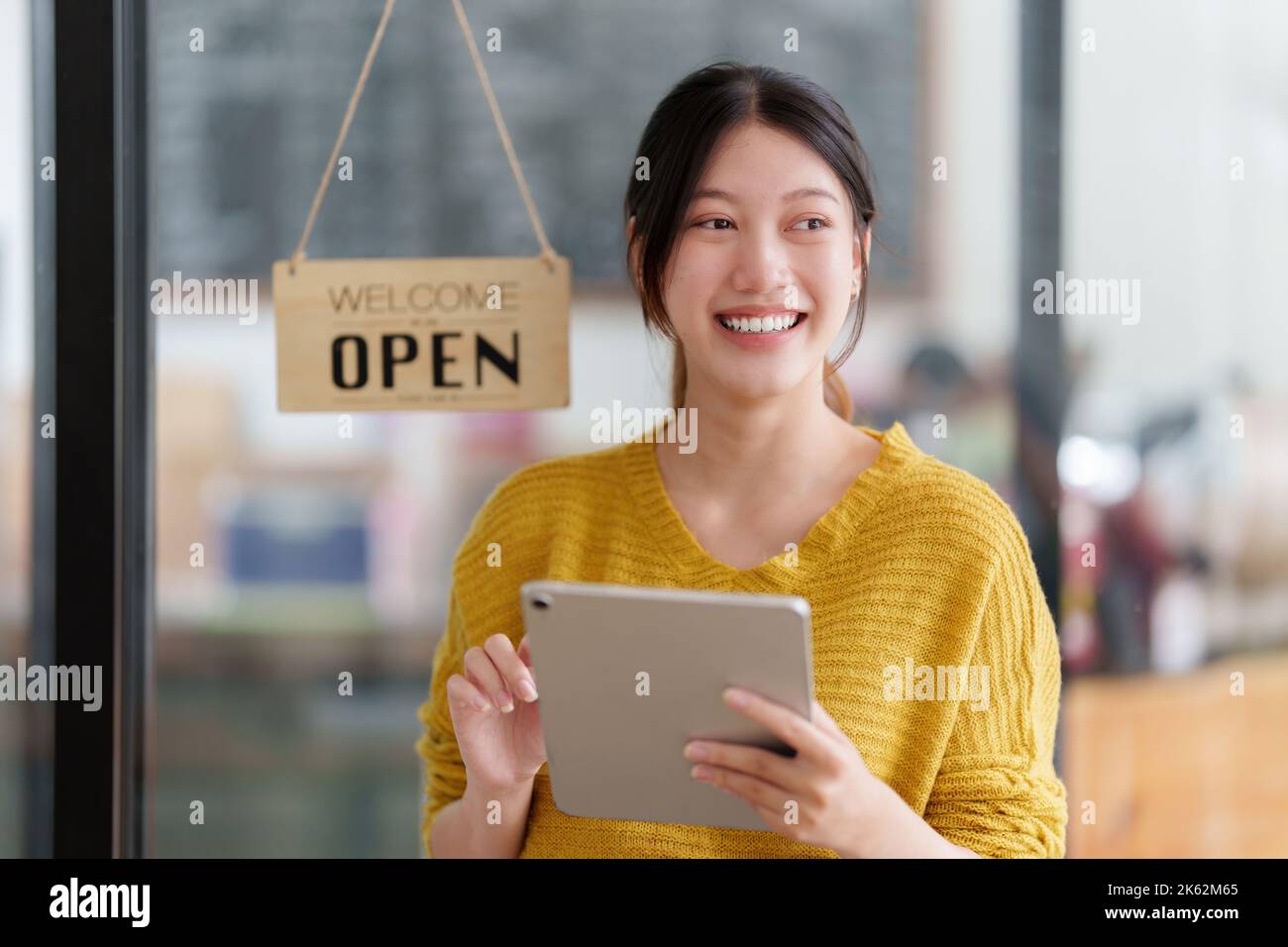 Portrait of Startup successful small business owner in coffee shop. SME ...