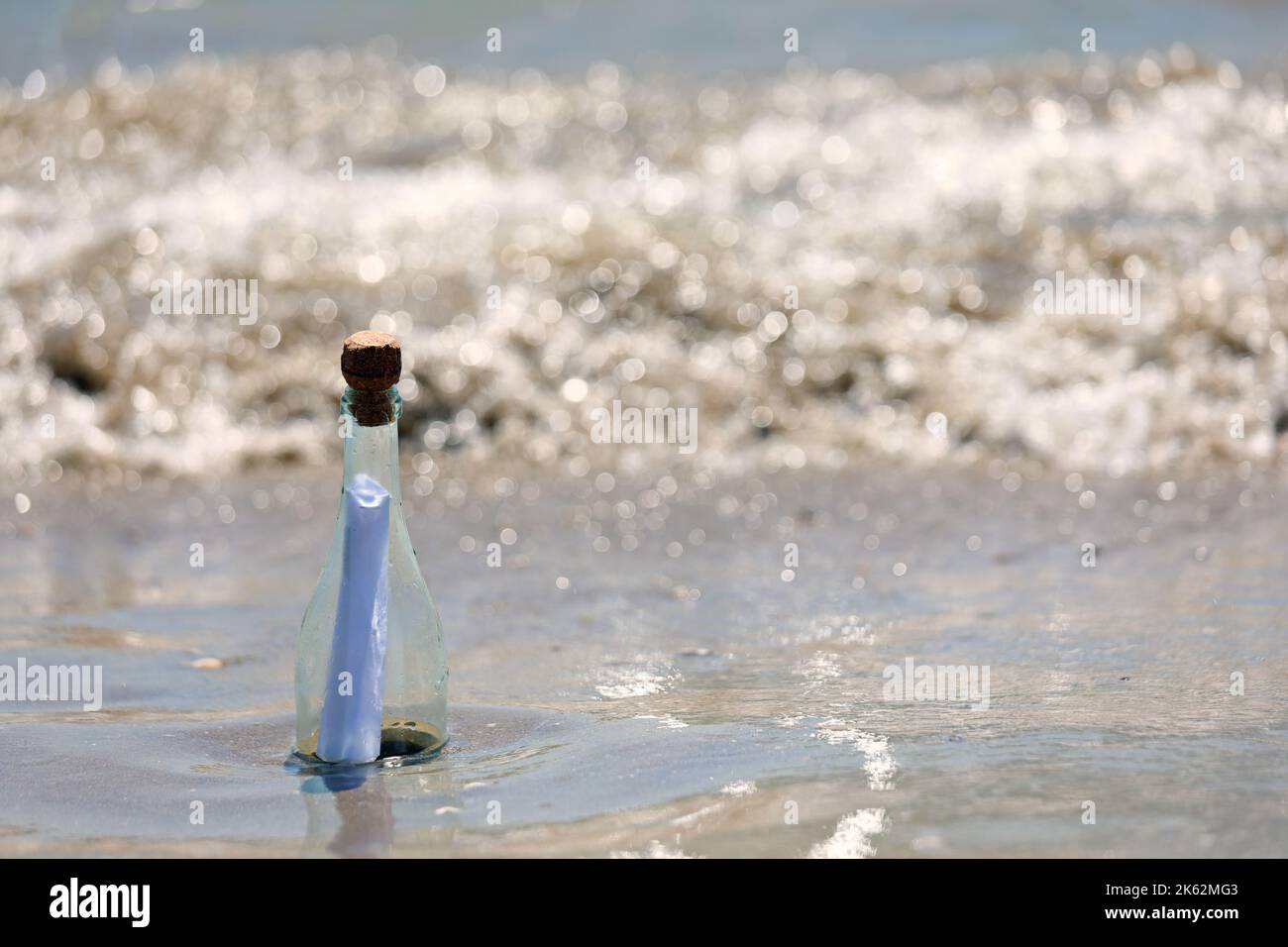 clear glass bottle with secret message inside by the sea Stock Photo ...