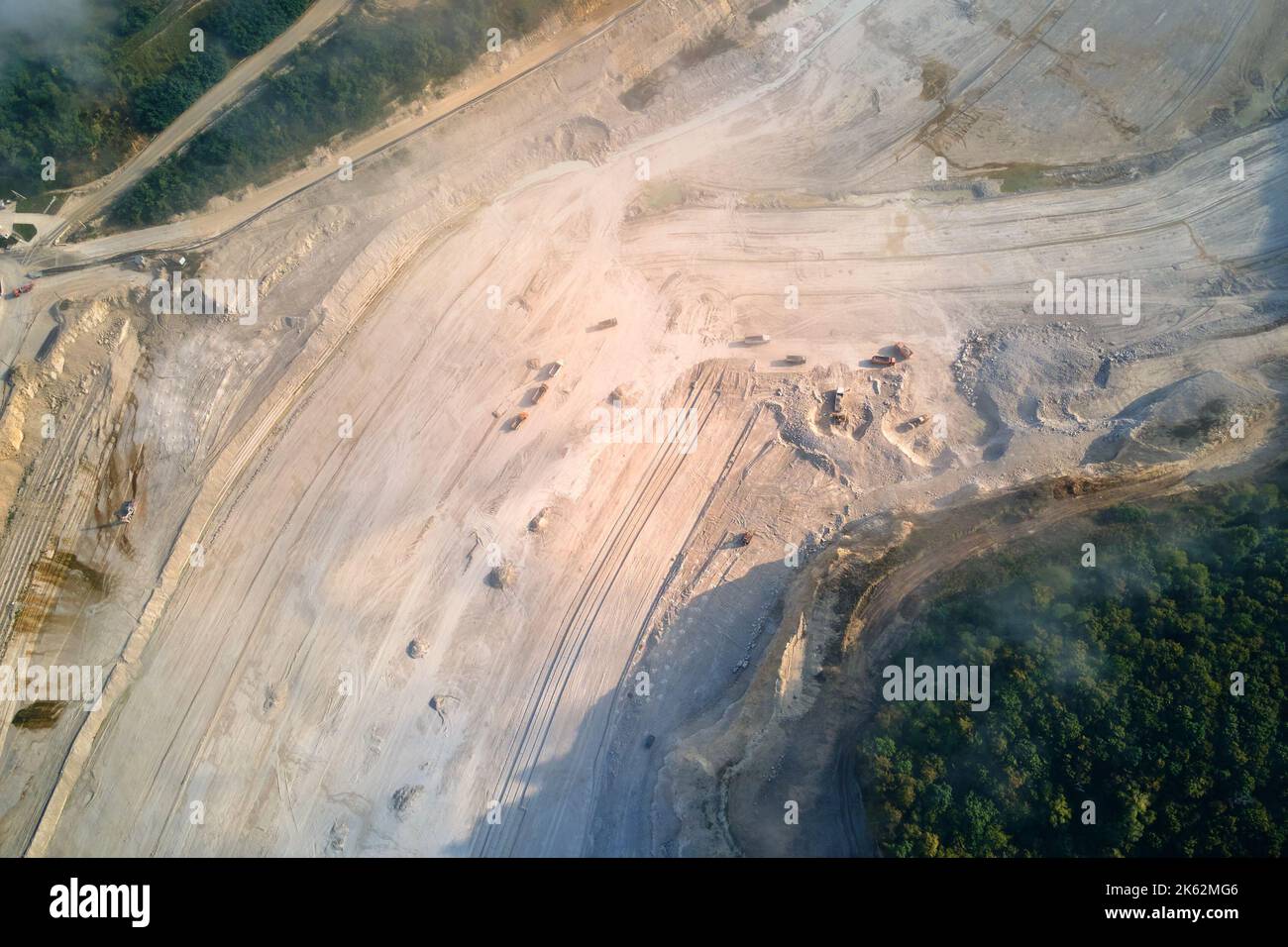 Aerial view of open pit mining site of limestone materials extraction ...