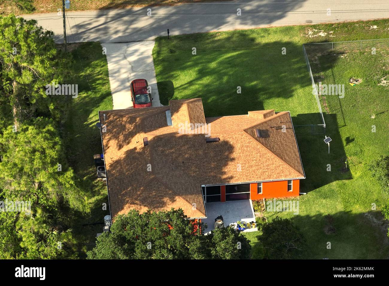 Aerial view of typical contemporary american private house with roof ...