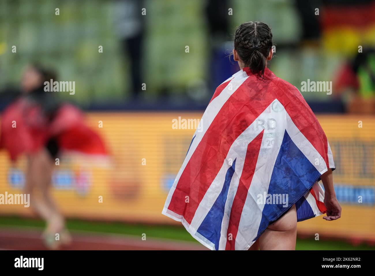 Elizabeth Bird with her country's flag of the 3000m steeplechase at the ...
