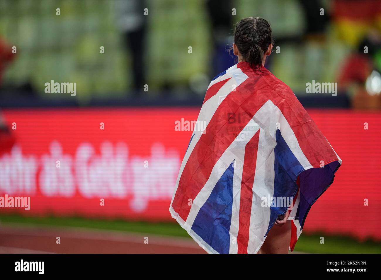 Elizabeth Bird with her country's flag of the 3000m steeplechase at the ...