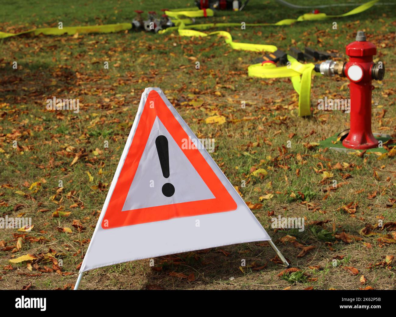 triangle with large exclamation mark and a red fire hydrant Stock Photo ...