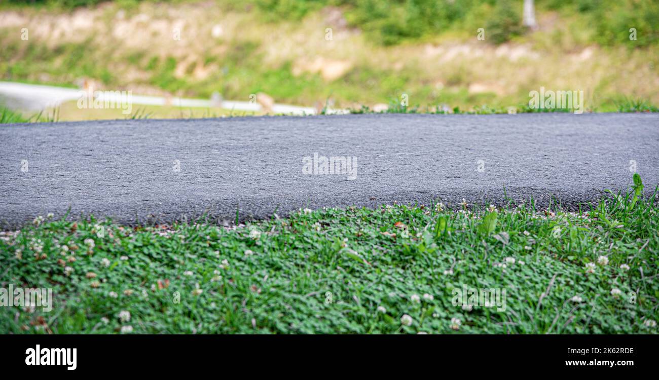 Tarmac path grass hi-res stock photography and images - Alamy