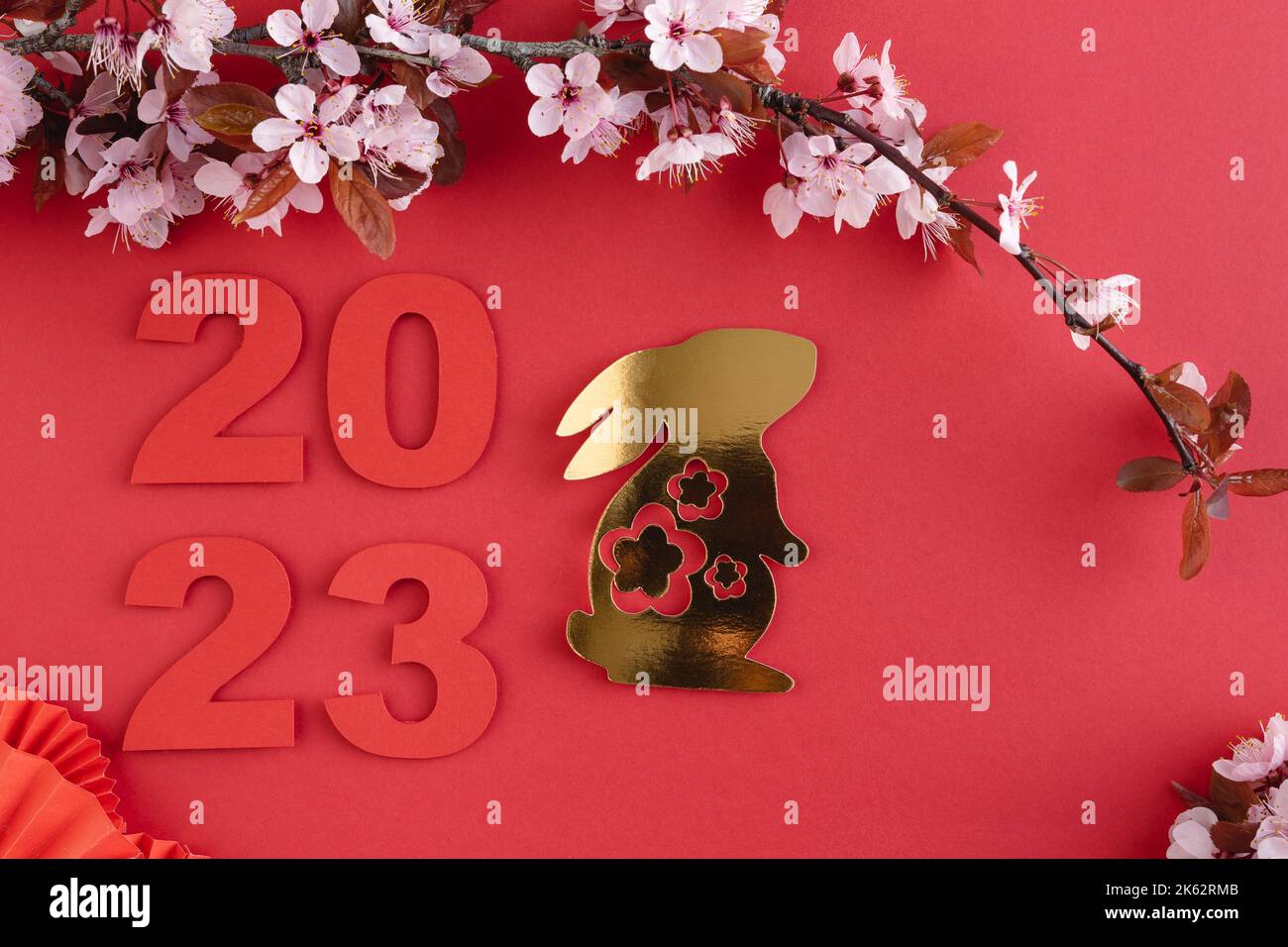 Chinese New Year, year of the rabbit. Red background with golden rabbit ...