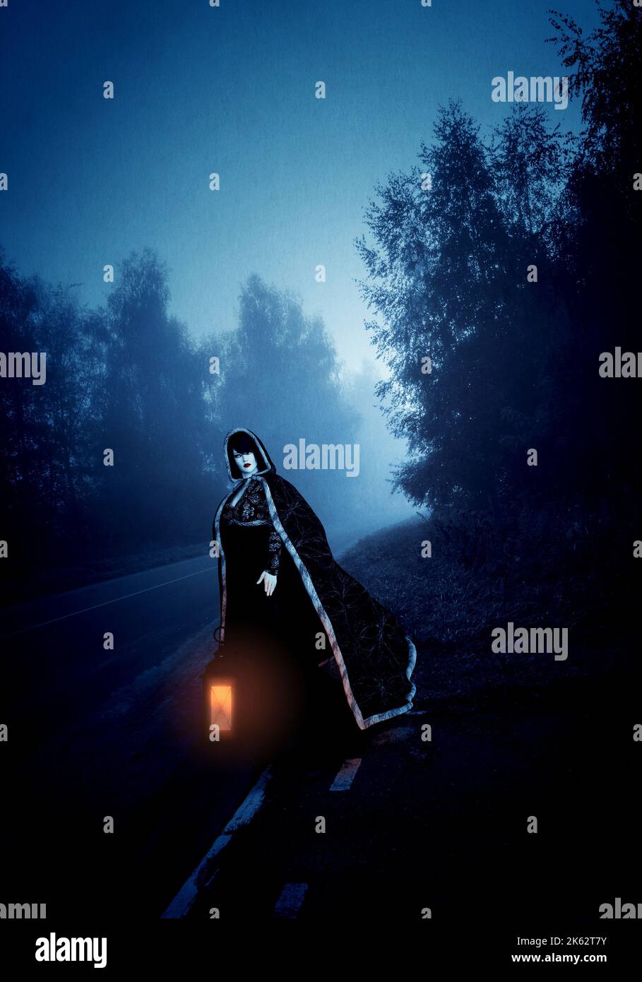 Lone woman with ancient lantern wear hooded cloak walk on the night ...