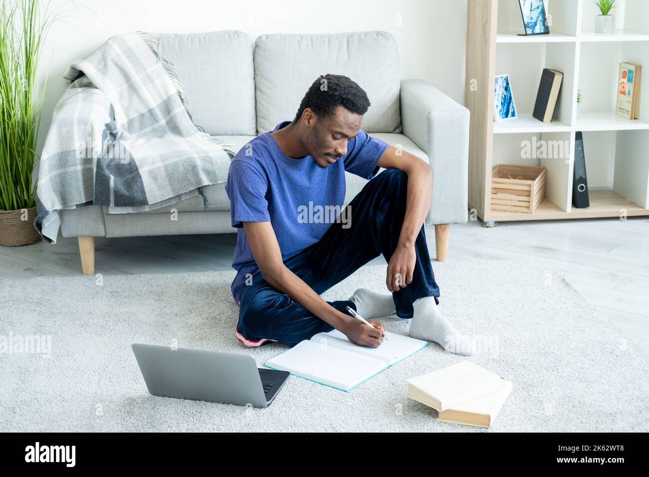 distance education studying man homework doing Stock Photo - Alamy
