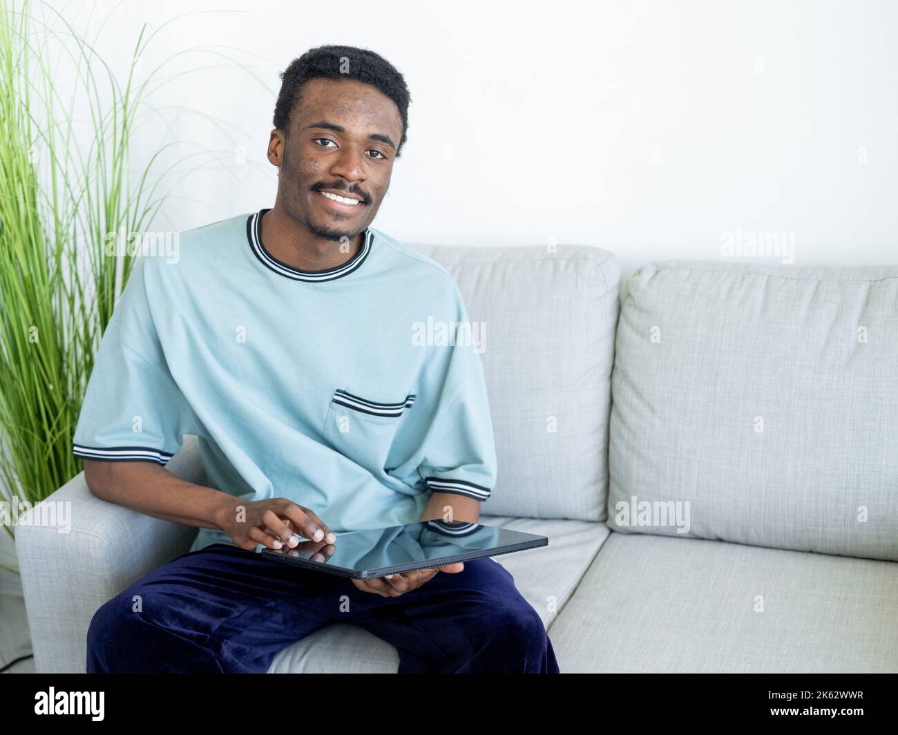 distance education happy man digital technology Stock Photo - Alamy