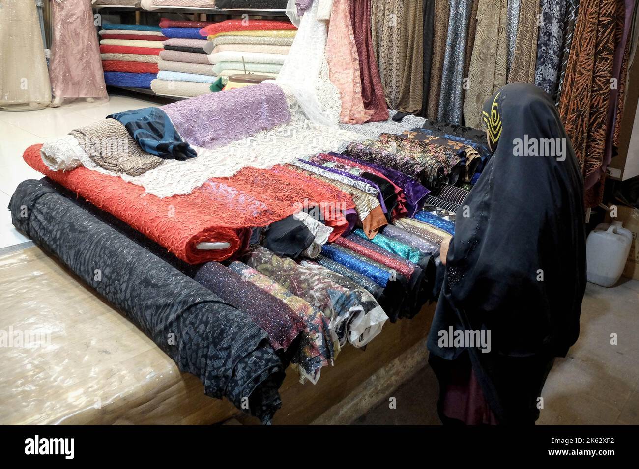 Shiraz, Fars, Iran. 9th Oct, 2022. An Iranian veiled woman walks past ...