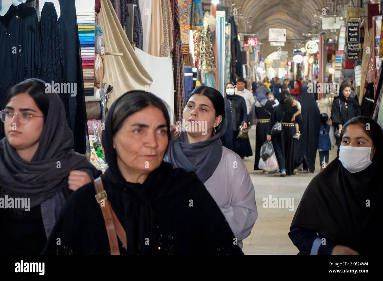 Shiraz, Fars, Iran. 9th Oct, 2022. Iranian women walk past in Vakil ...