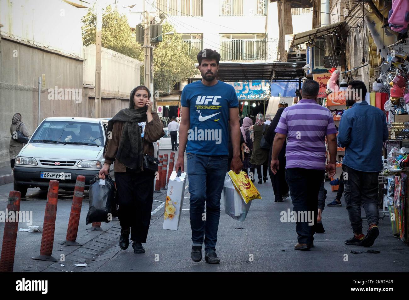 Shiraz, Fars, Iran. 9th Oct, 2022. Iranian women walk past in a street ...