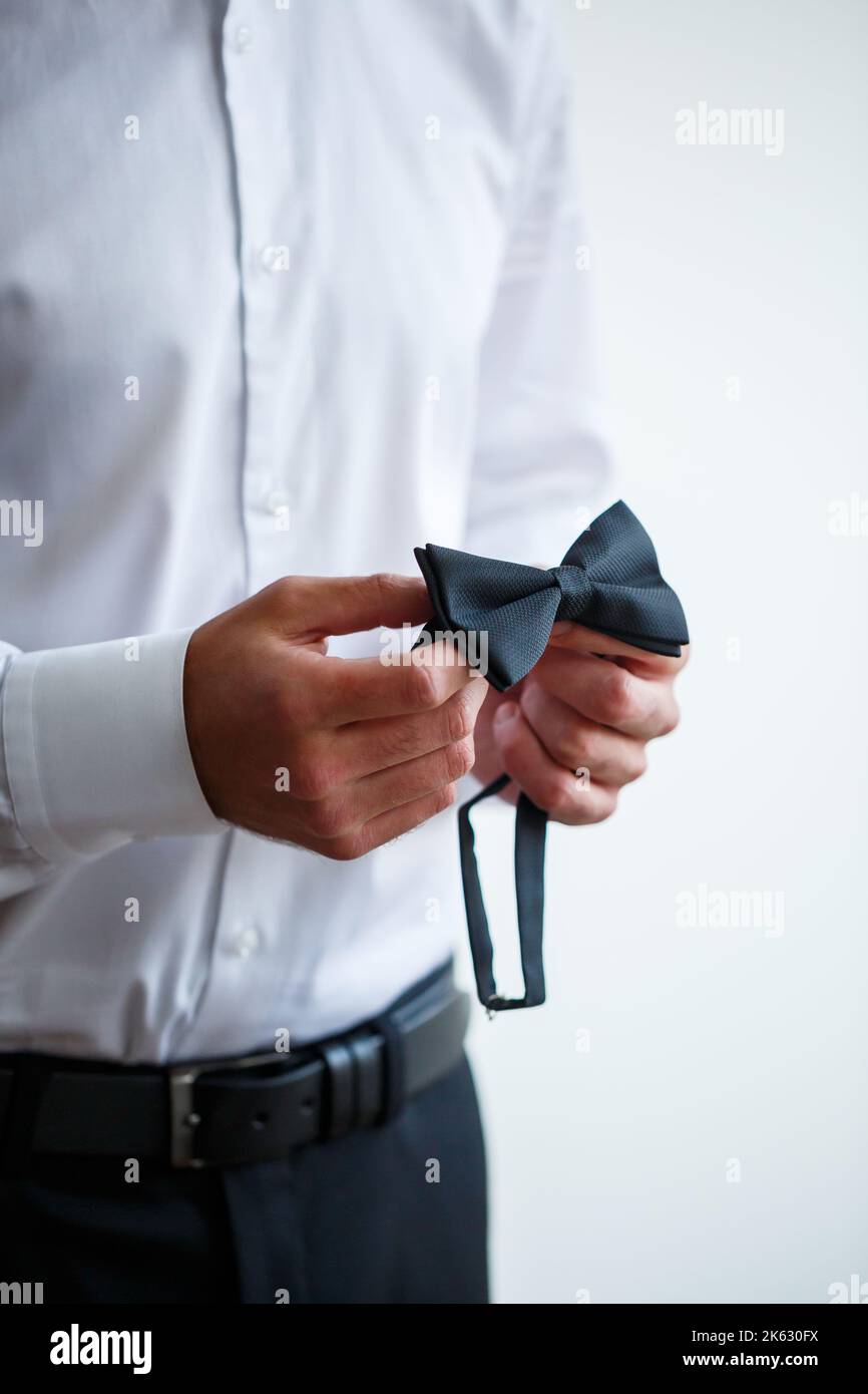Young male businessman dressed in a white shirt with a short beard ...