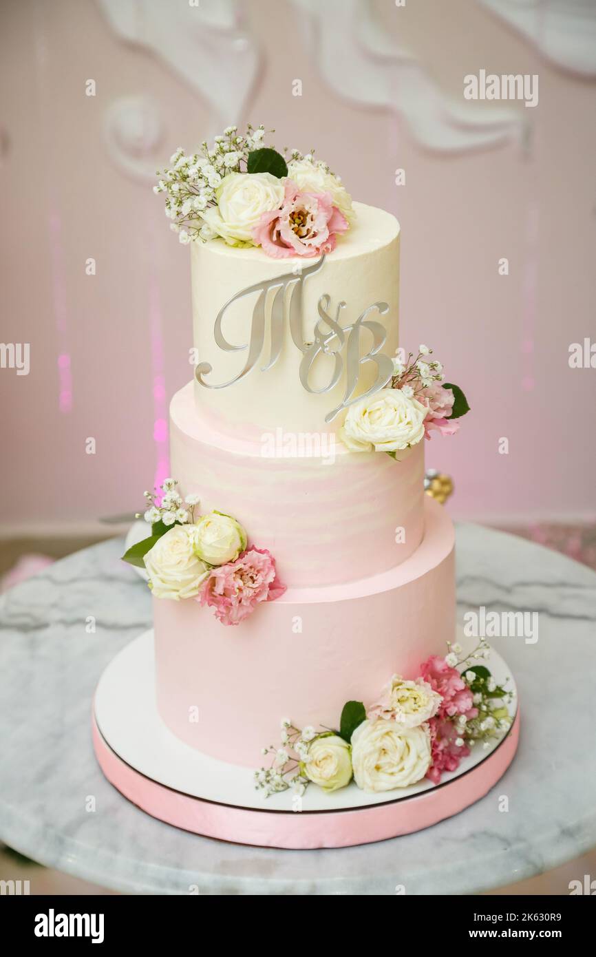 Beautiful tiered delicious dessert sweet cake for newlyweds Stock Photo ...