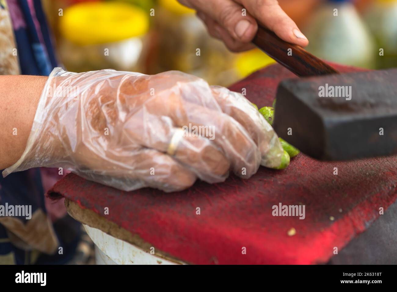 traditional handmade green olive crushing process , unhygienic product ...