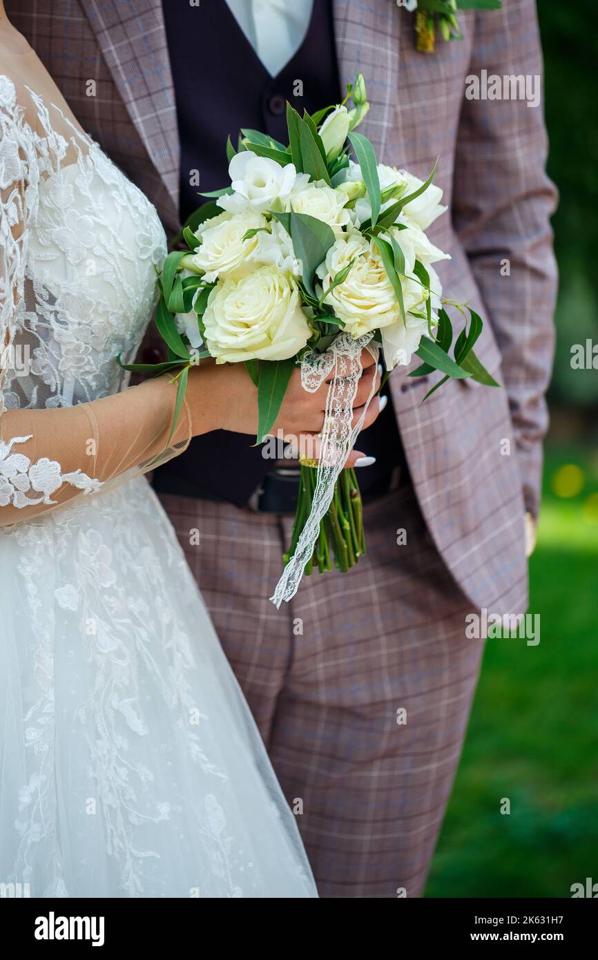 Bride and groom hugging on a wedding day Stock Photo - Alamy