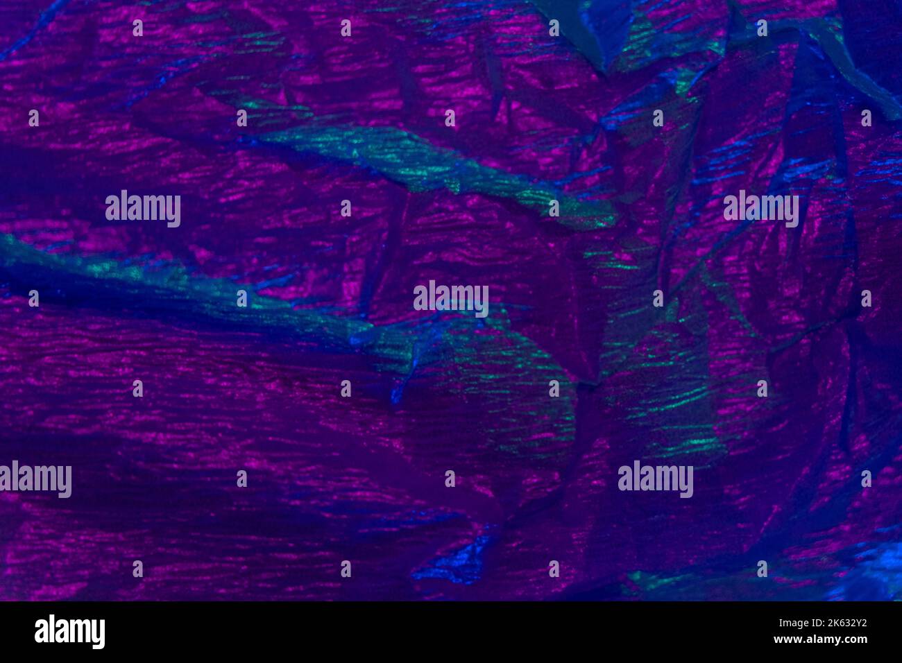 ultraviolet background creased texture neon purple Stock Photo - Alamy