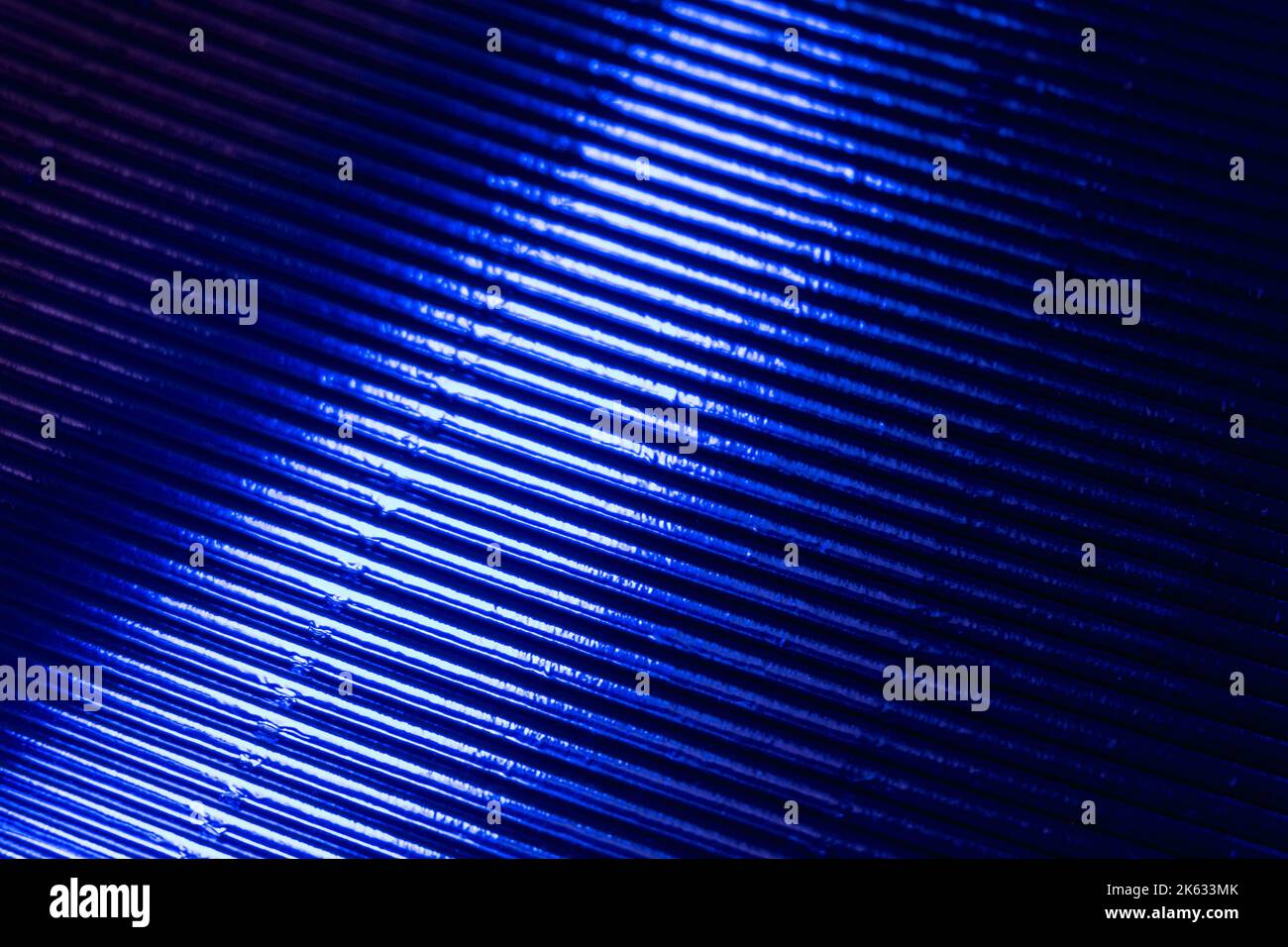 corrugated texture neon light background blue glow Stock Photo - Alamy