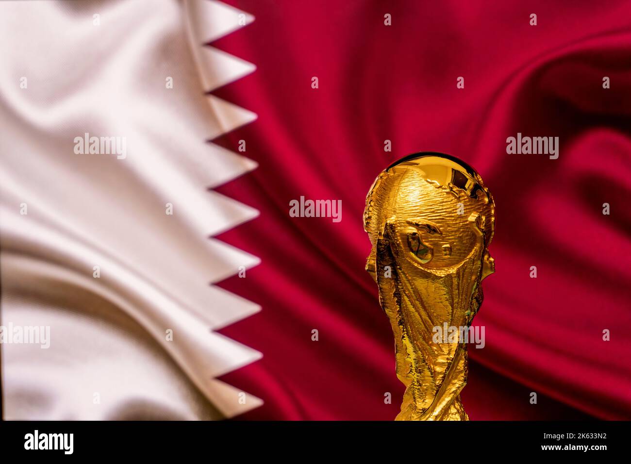 FIFA World Cup trophy against the background of Qatar flag Stock Photo ...