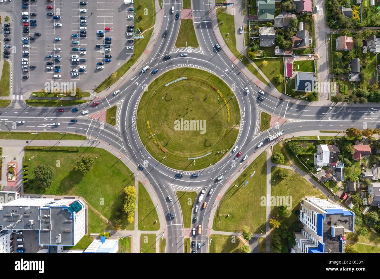 aerial view of huge road junction of freeway with heavy traffic at city ...