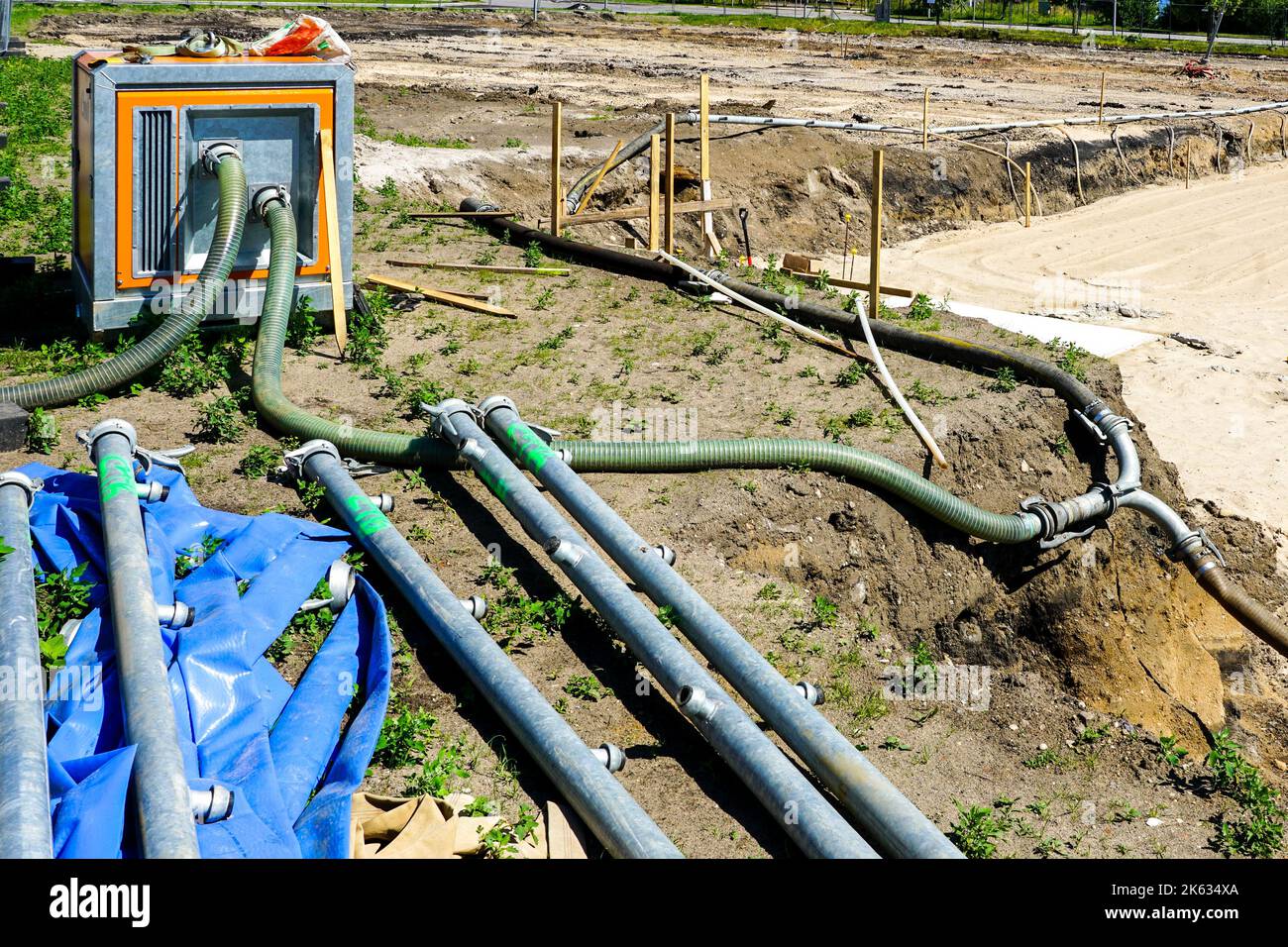 Large portable electric water pump with hose for dewatering the deep ...