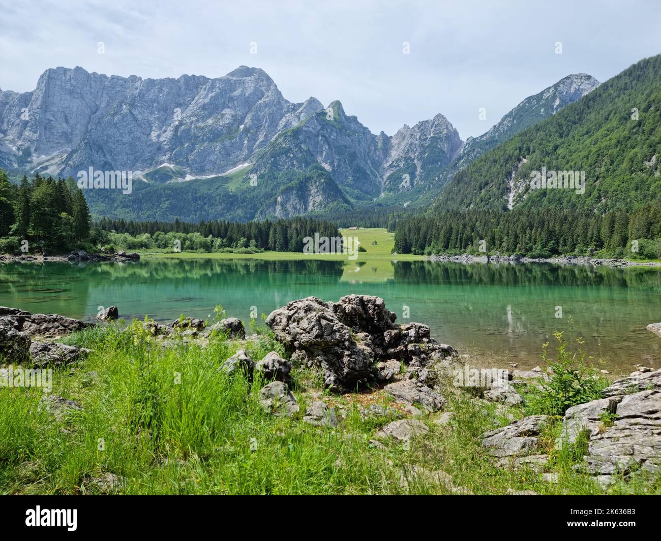 A heavenly view of Lago di Fusine Superiore in Tarvisio, Italy Stock ...