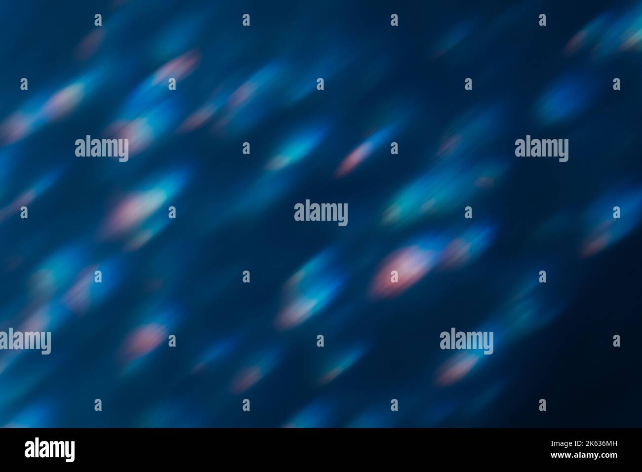 bokeh light lens flare overlay blue flecks dark Stock Photo - Alamy