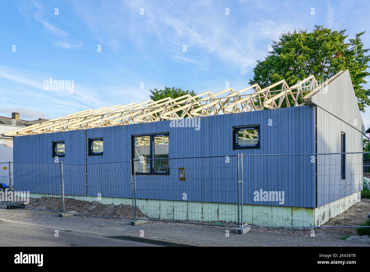 Construction of new and modern prefabricated modular house from wood ...