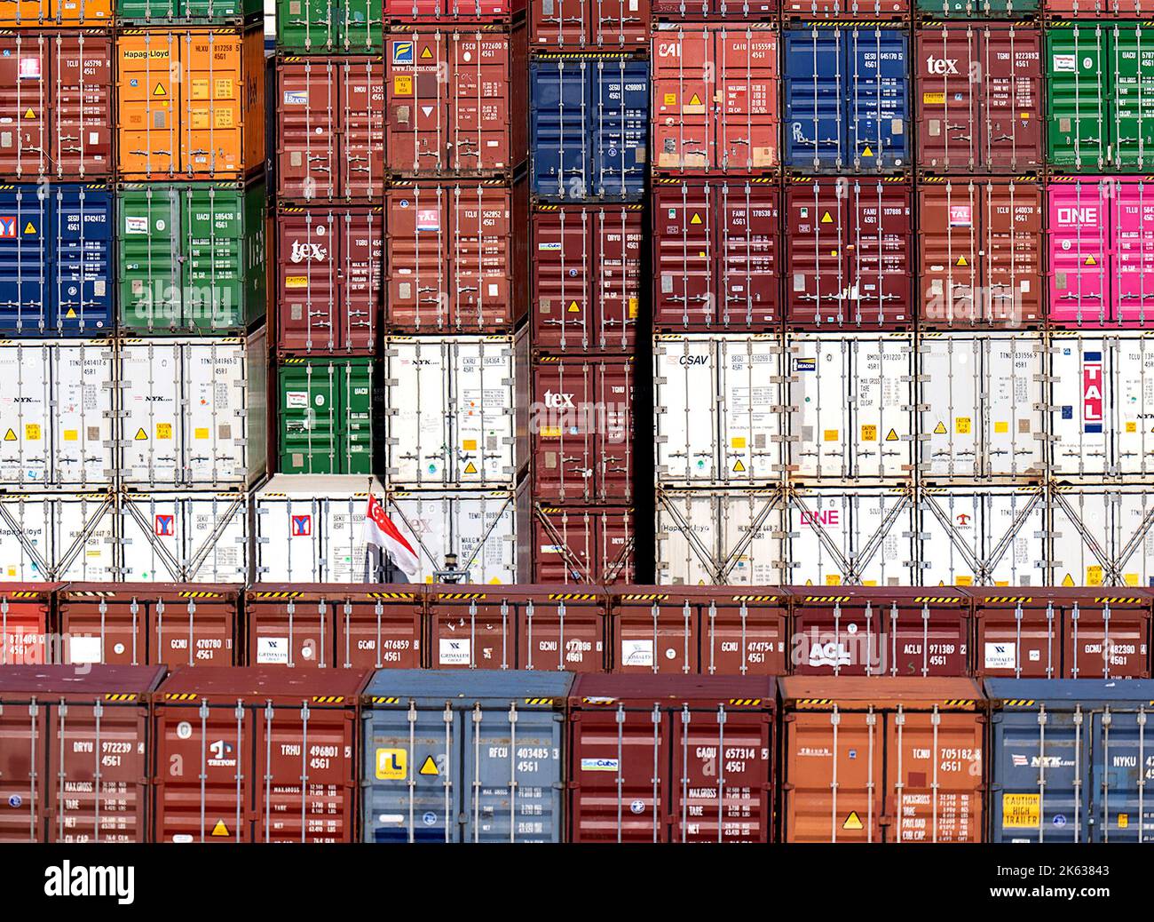 Shipping containers are stacked on a cargo vessel at the PSA Halifax ...