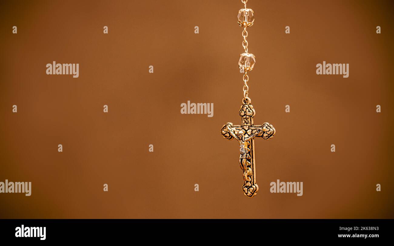 detail of a crucifix, colored background, christian symbol, with ...