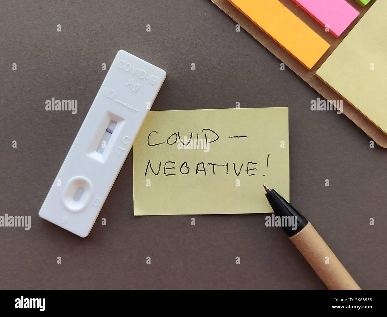 Negative Covid test in hand, close-up on Covid-negative caption, text ...