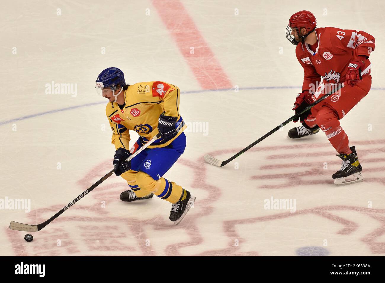 Trinec, Czech Republic. 11th Oct, 2022. From left Marc Wieser of Davos ...