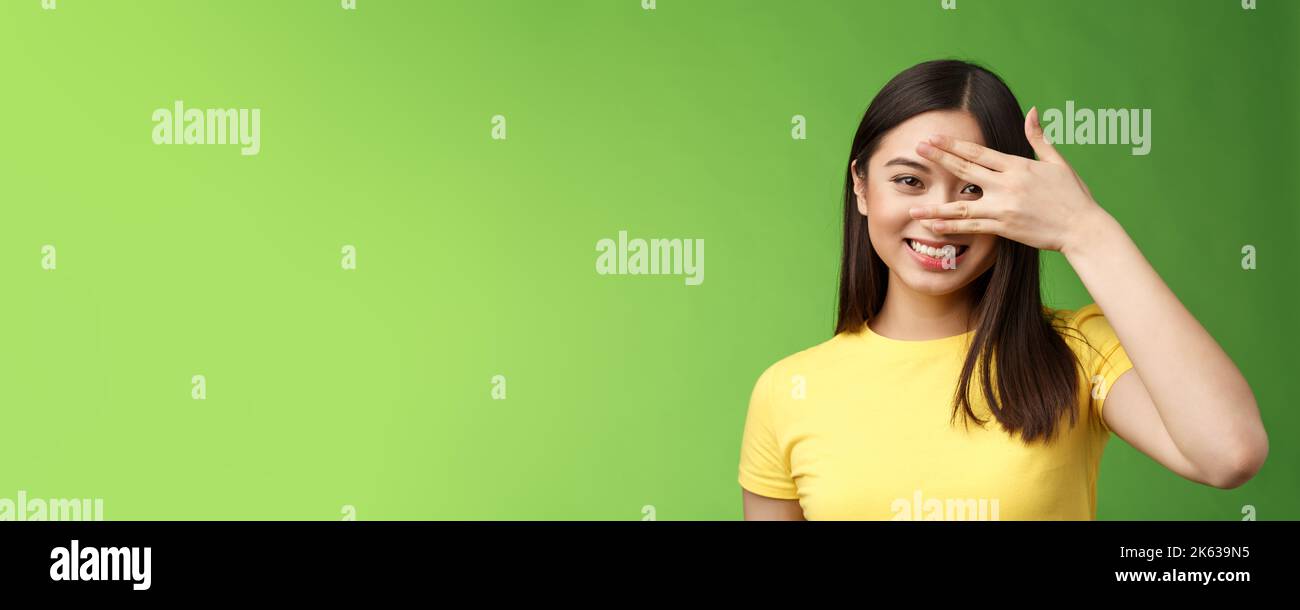 Cheerful enthusiastic cute asian brunette girl smiling broadly, toothy ...