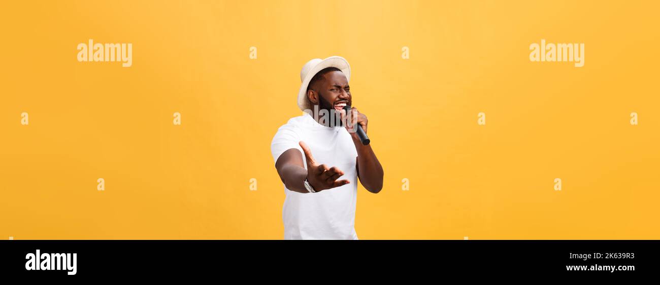Young teenage black African American boy singer performing at a concert ...