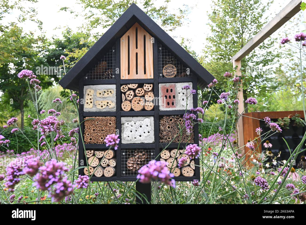 Decorative Insect house with compartments and natural components Stock ...