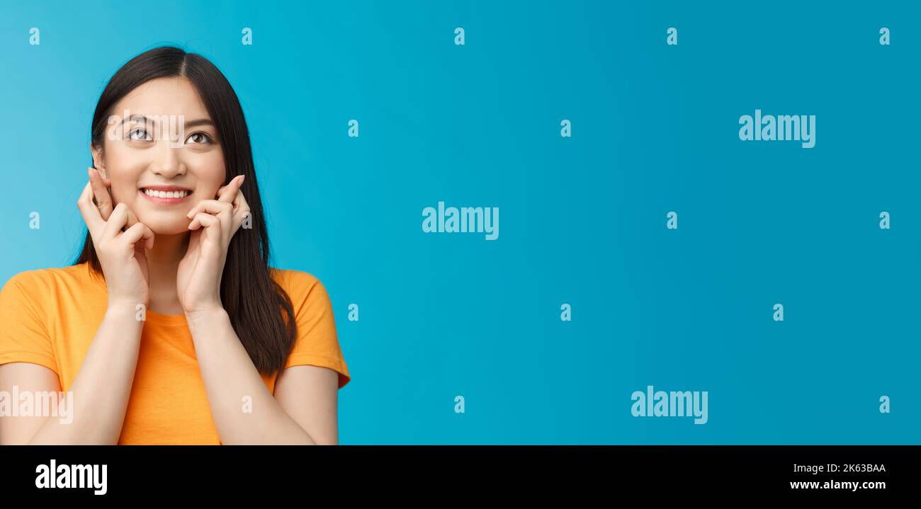 Hopeful excited cute optimistic asian girl believe dreams come true ...
