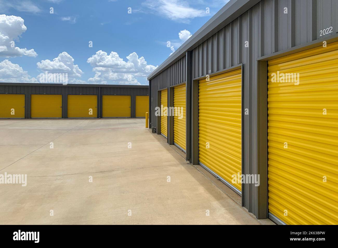Outdoor shot of warehouses, storage facility, hangars or garages with ...