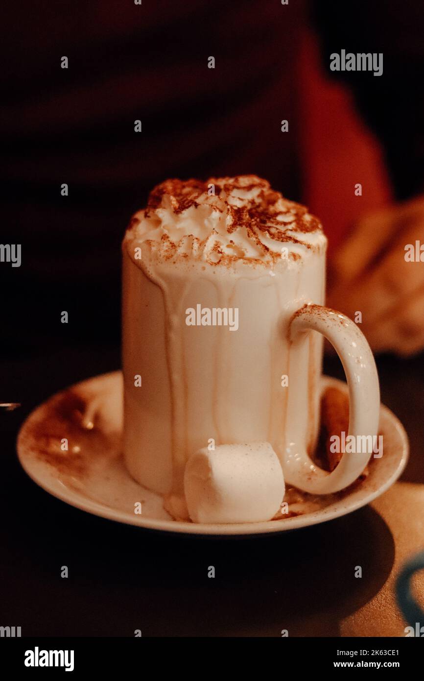 A vertical shot of a cup of hot chocolate with whipped cream Stock ...