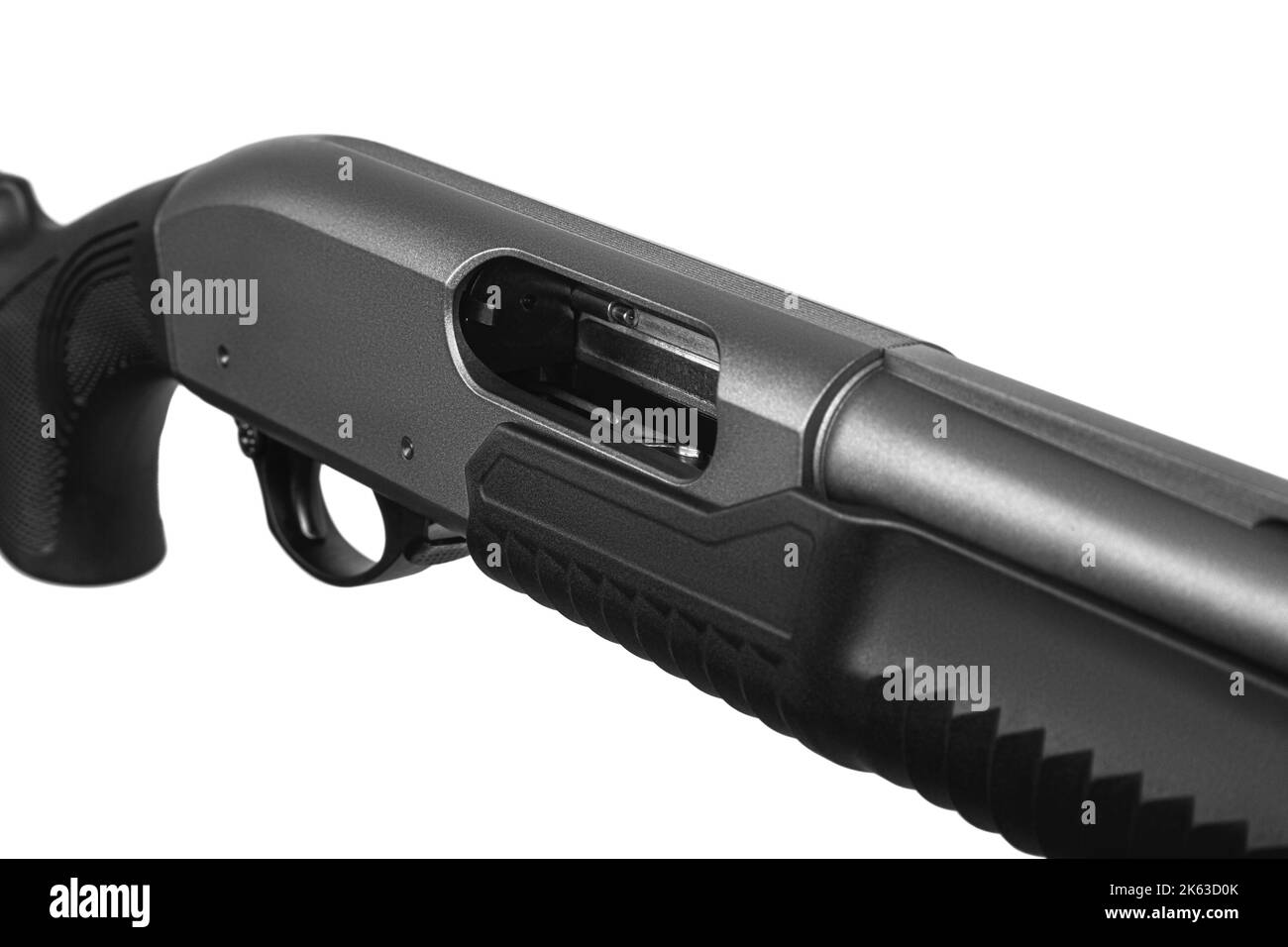 Pump-action 12 gauge shotgun isolated on a white background. A smooth ...