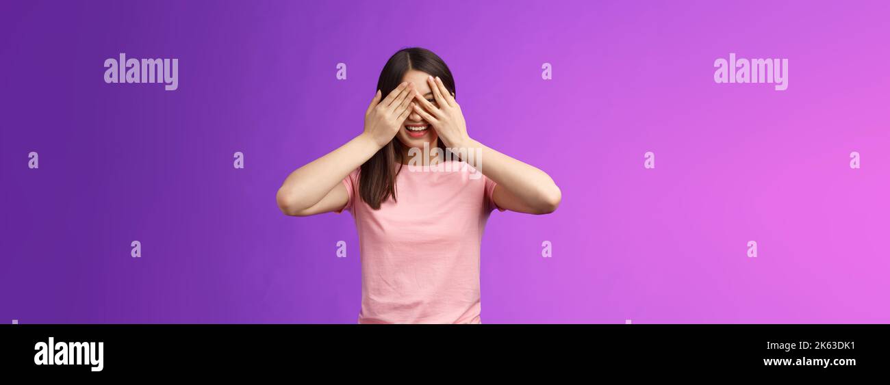 Girl waiting command open eyes, lively giggle smiling happily, cover ...