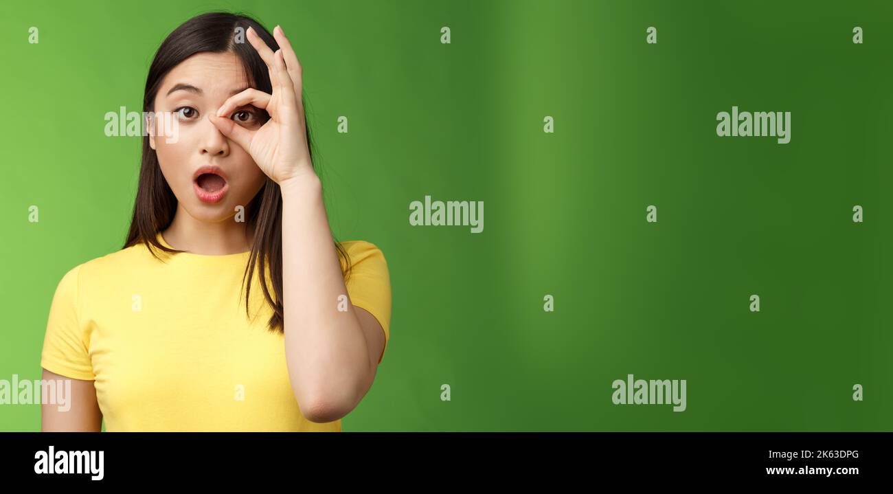 Amazed speechless cute asian young girl drop jaw astonished, look ...