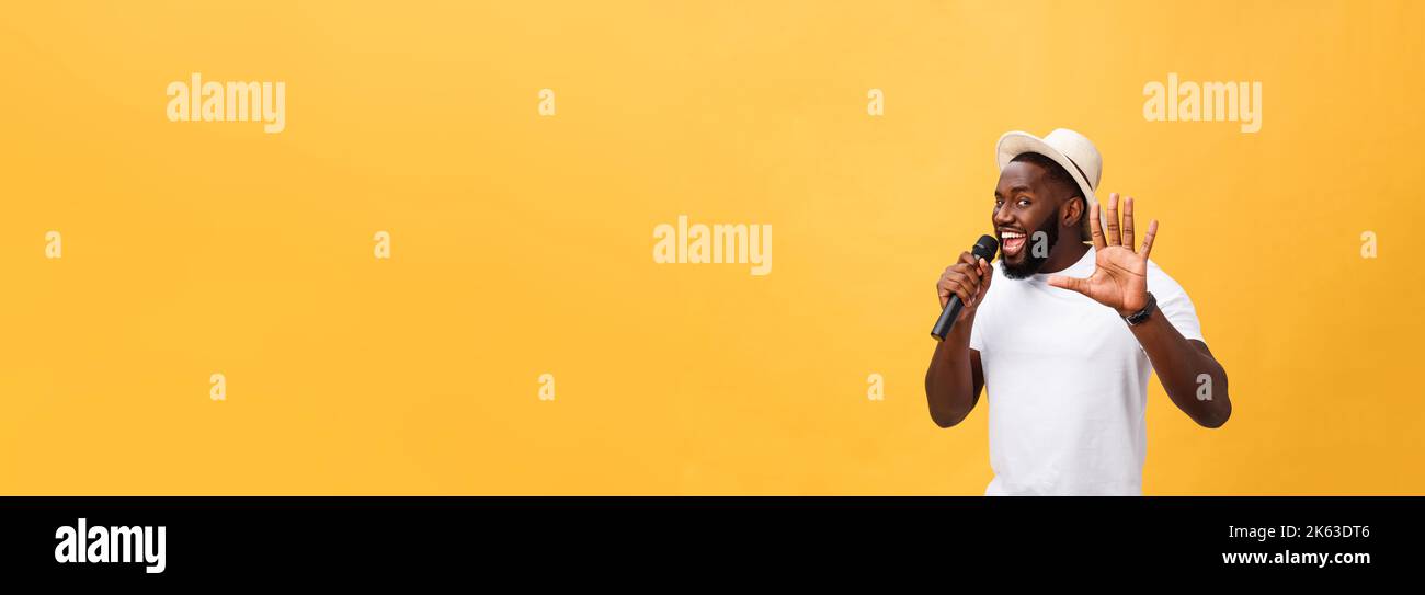 Young teenage black African American boy singer performing at a concert ...
