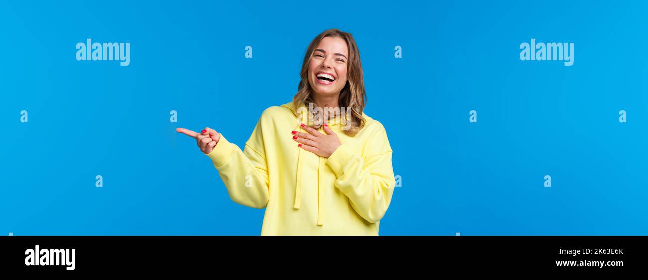 Waist-up portrait of laughing girl having fun, discuss hilarious ...