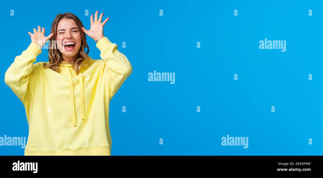 Try catch me. Alluring carefree european female with blond hair having ...