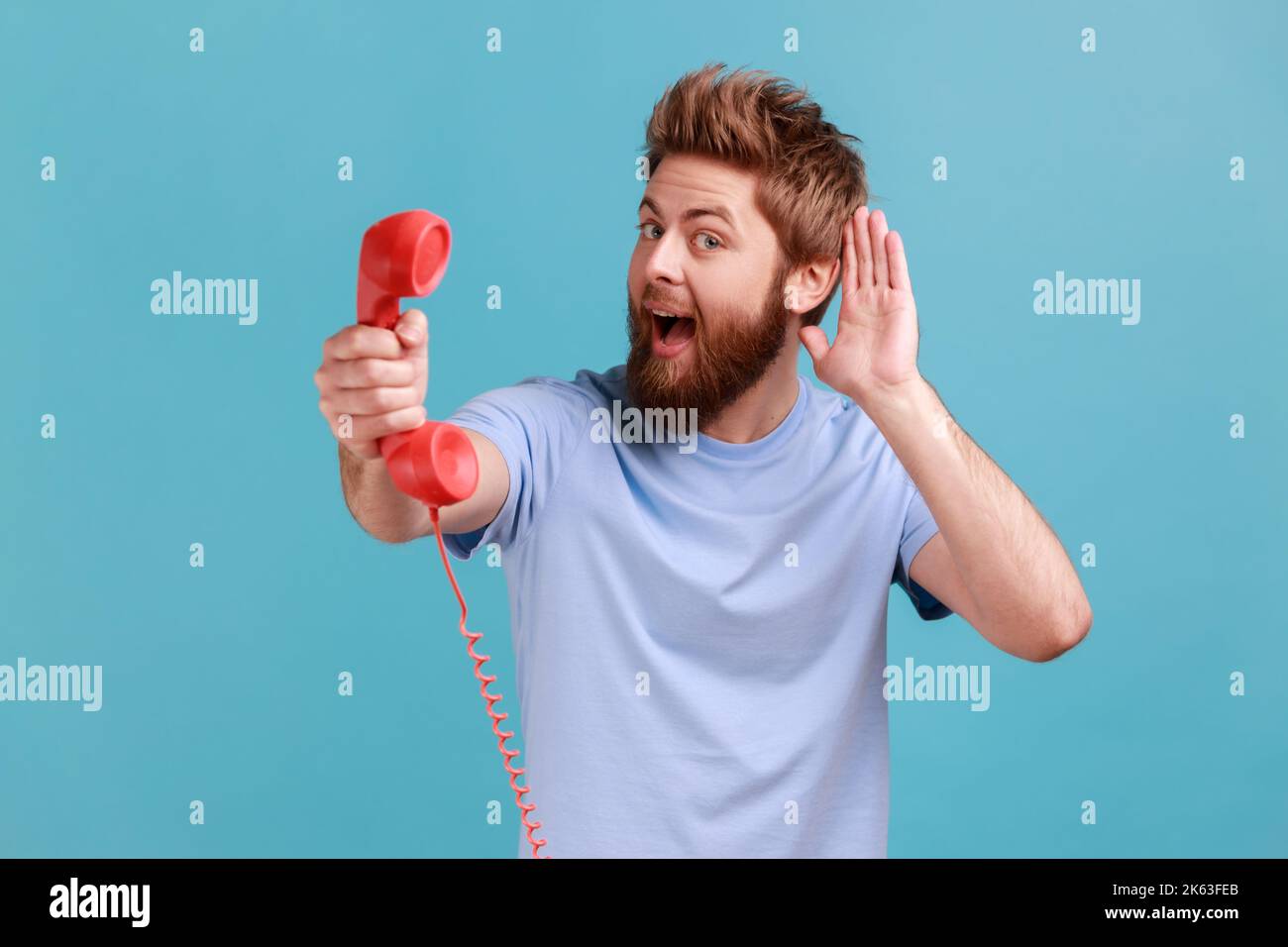 Talking by ear hi-res stock photography and images - Alamy