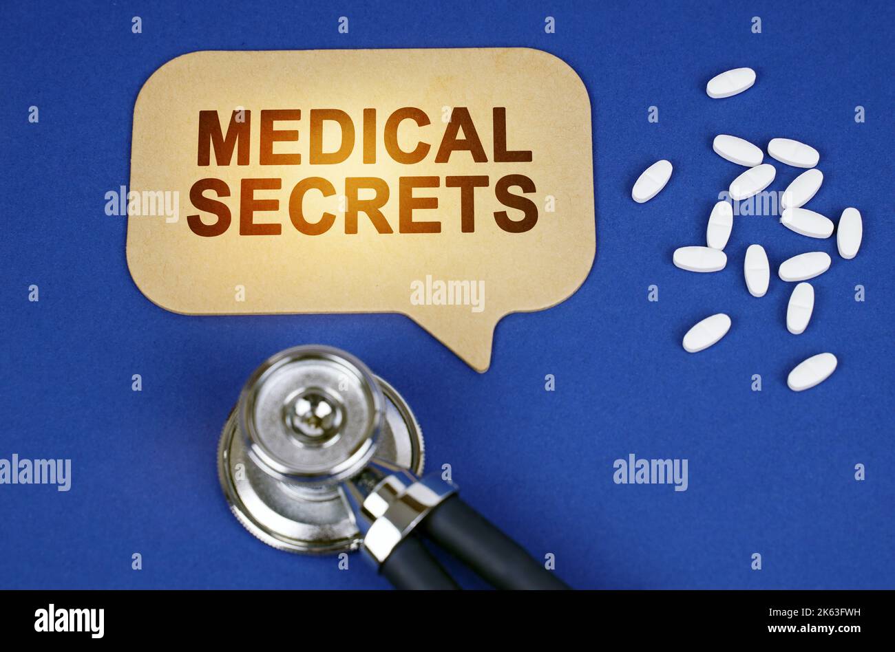 Medical concept. On the blue surface of the tablet, a stethoscope and a ...