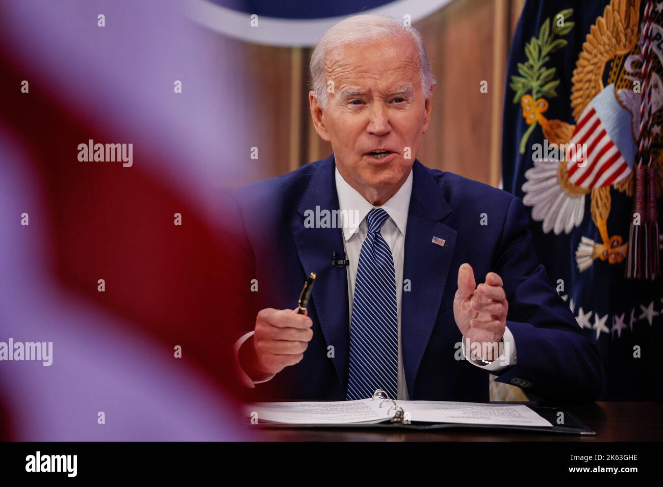 President Joe Biden addresses a virtual audience attending the Summit ...